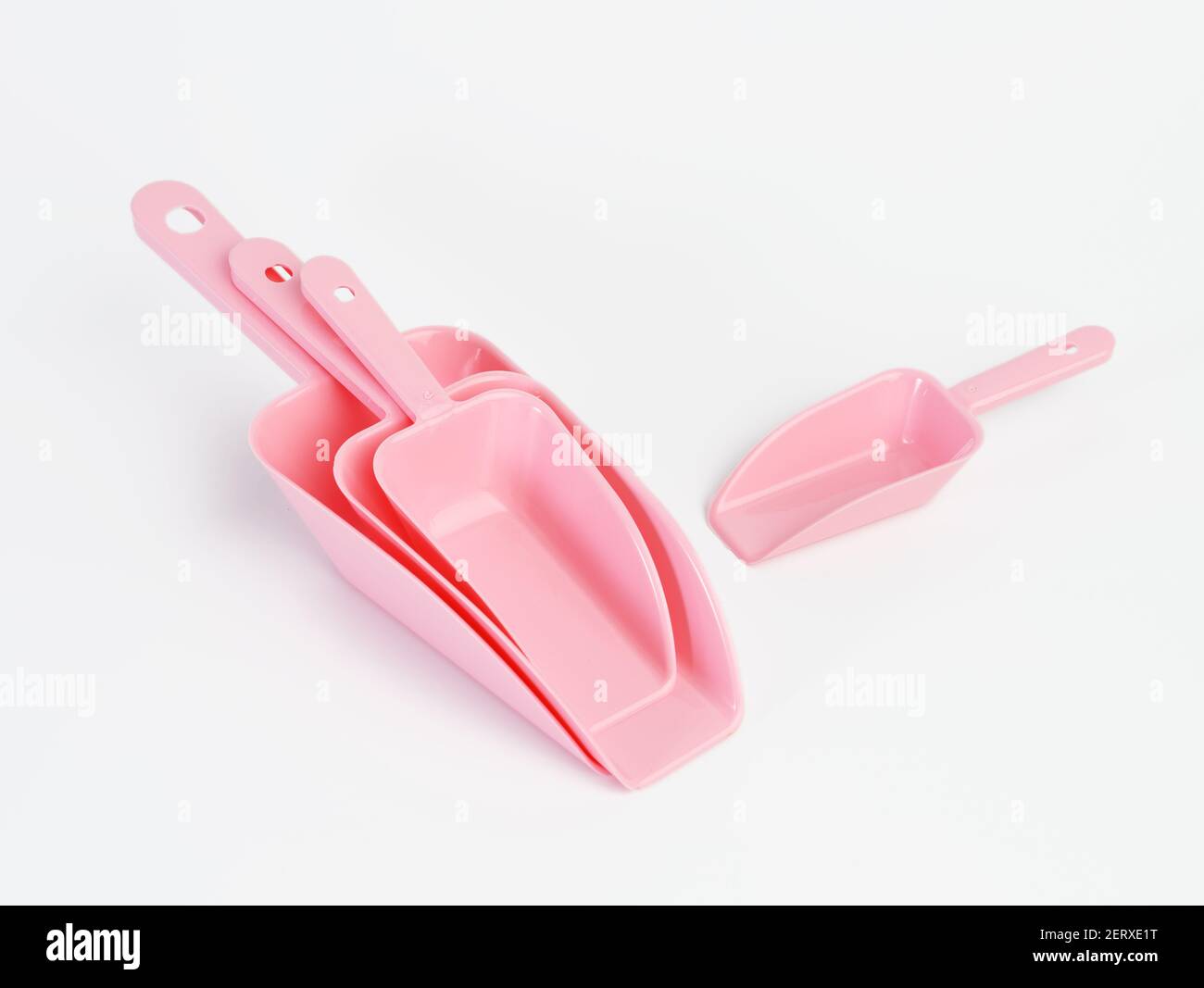 set of plastic kitchen scoops for bulk products on white background ...