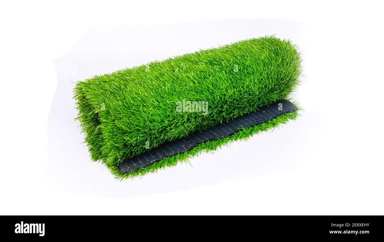 roll of plastic turf for sports grounds isolate on white background ...
