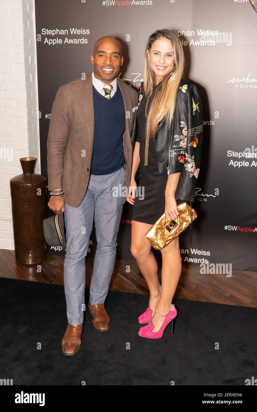 Tiki Barber and Tracie Lynn and attend the 2018 Stephan Weiss Apple ...