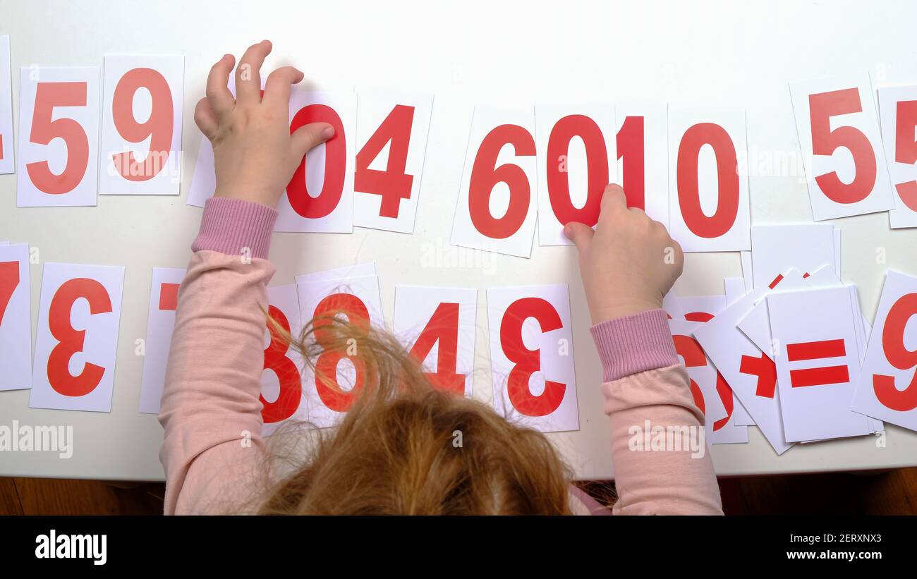 education a child count with plastic cards with numbers,childhood ...