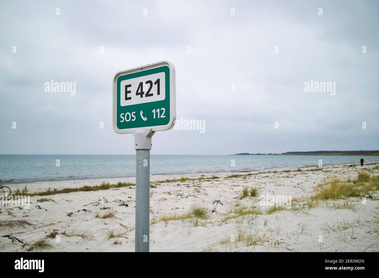 A green call for help sign at the beach Stock Photo - Alamy