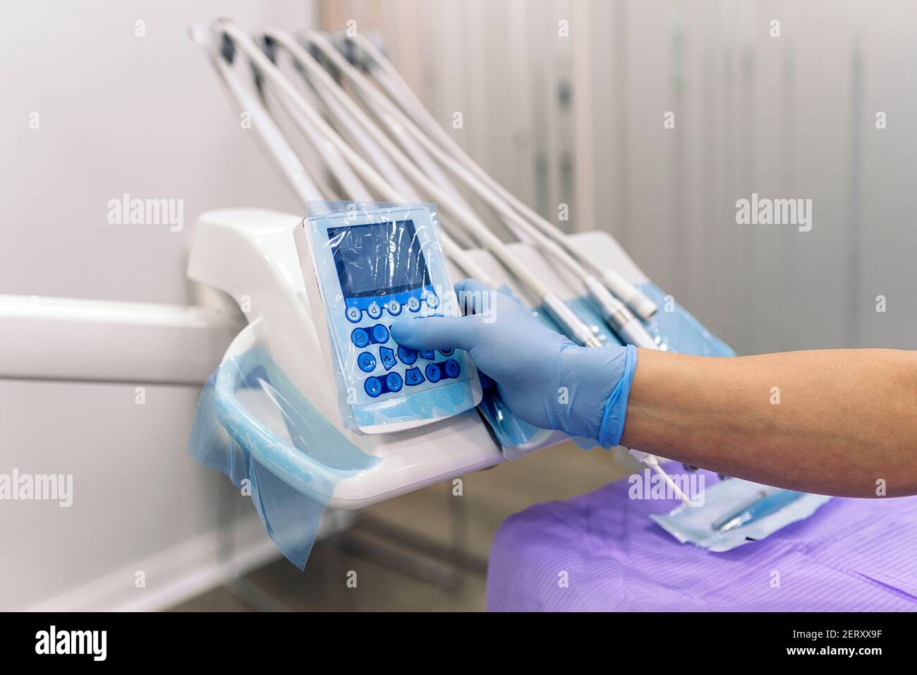 Stock photo of faceless dentist using medical equipment in dental ...