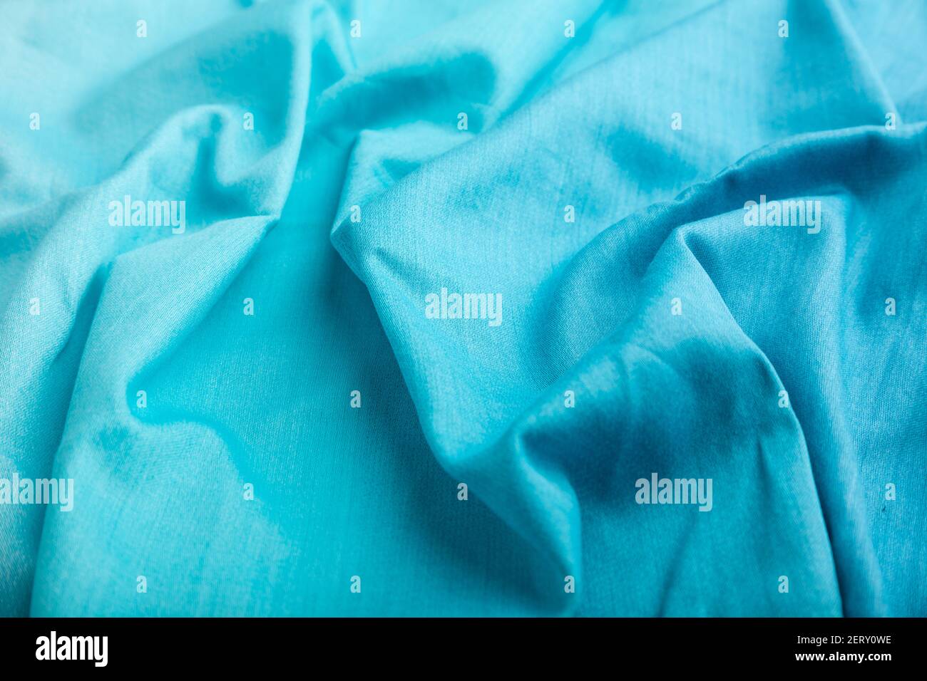 Fragment of cotton blue tissue. Side view, natural textile background ...