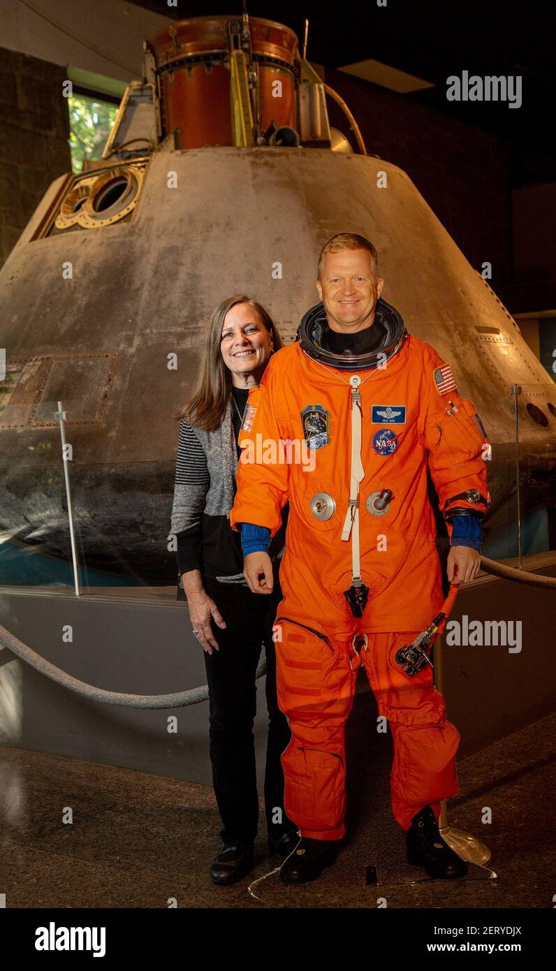Debi Huffman with a life-sized picture of astronaut Eric Boe at the ...