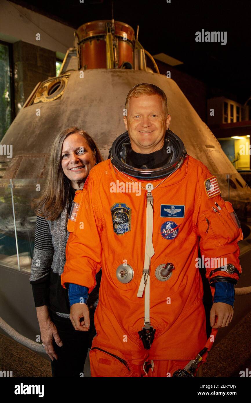 Debi Huffman with a life-sized picture of astronaut Eric Boe at the ...