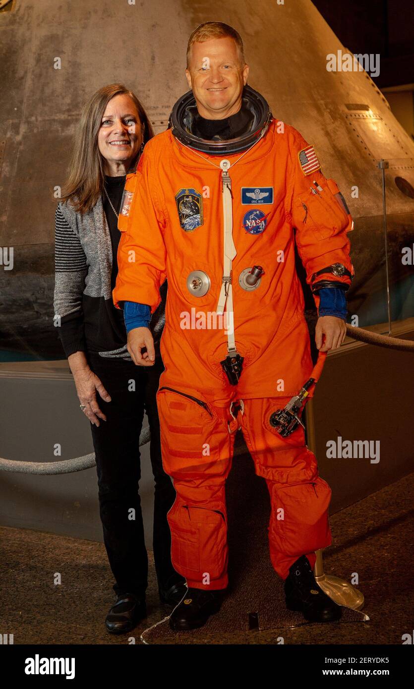 Debi Huffman with a life-sized picture of astronaut Eric Boe at the ...