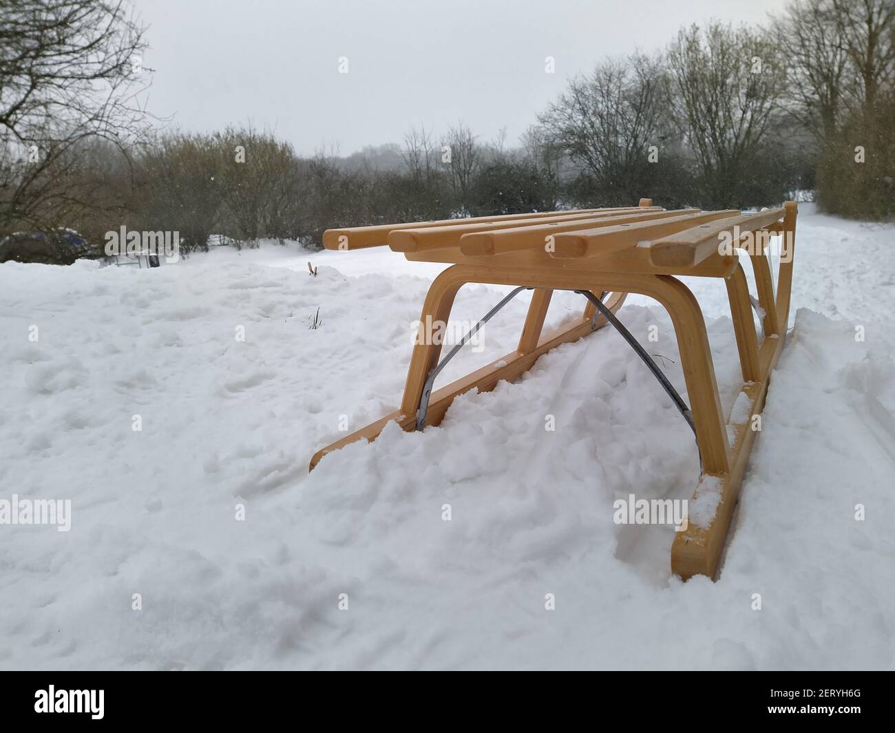 An old-style wooden sled on the snow Stock Photo - Alamy