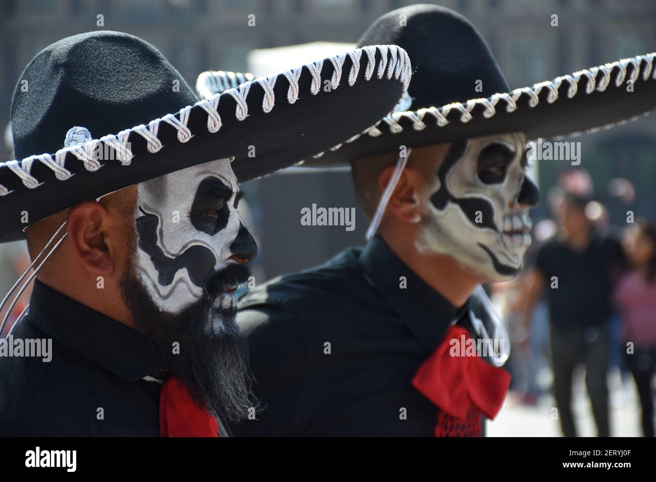 A Man dressed as Charro and the face painted as a skull looks during ...