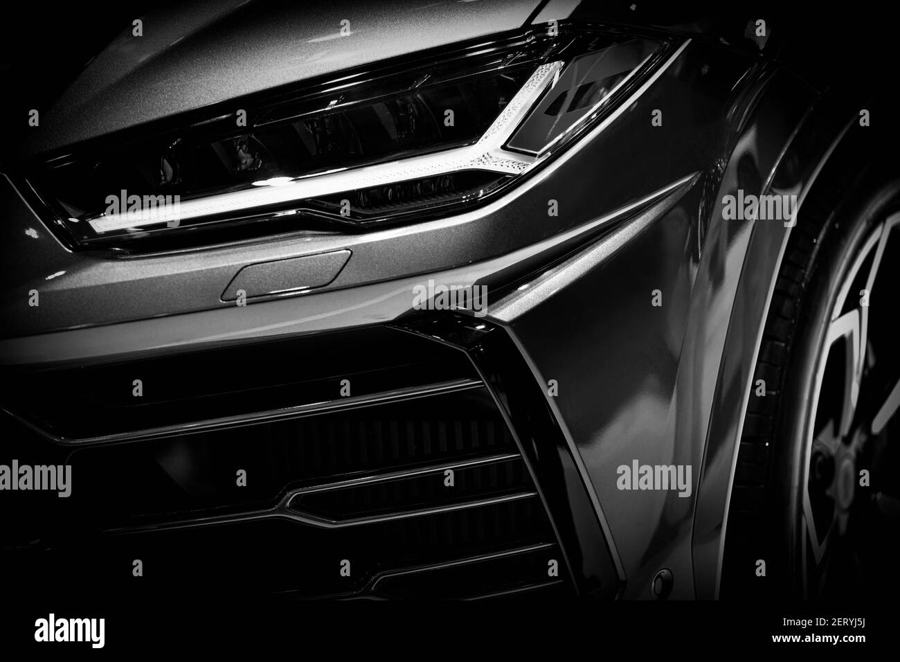 Detail on one of the LED headlights modern car on black background ...