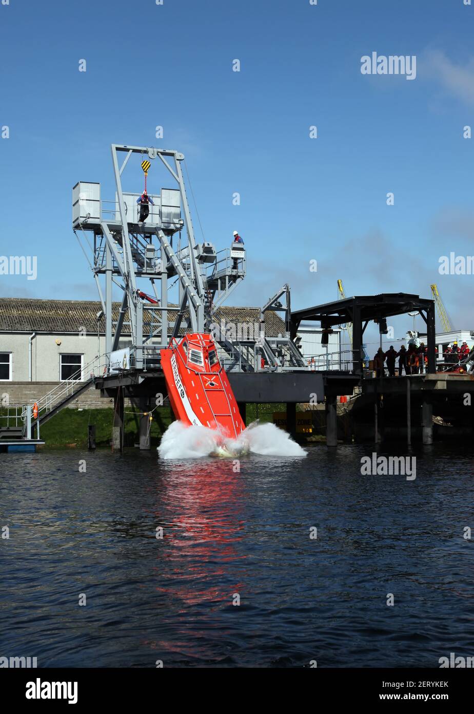 Sequence of a Free Fall Lifeboat being released and dropped Stock Photo ...