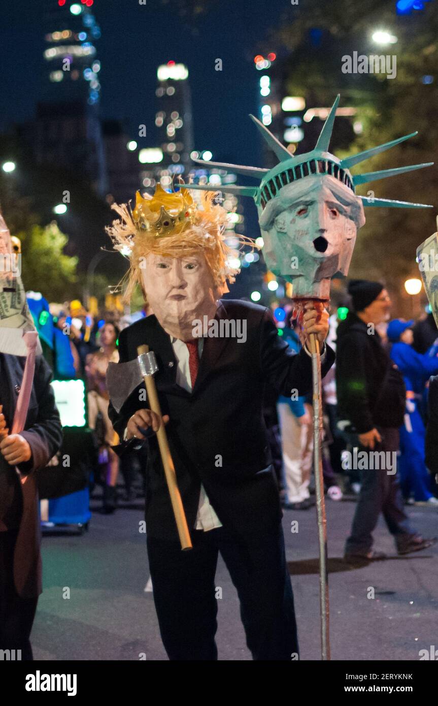 Participants dressed as President Donald Trump walk in the 2018 NYC ...