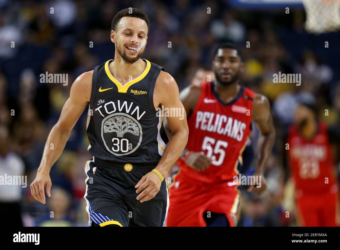 Golden State Warriors' Stephen Curry (30) runs down the court ahead of ...