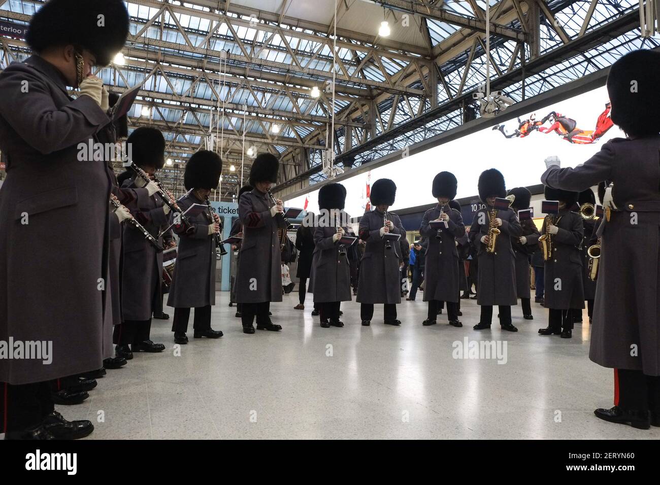 The band of the Grenadier guards performs at Waterloo Station in London ...