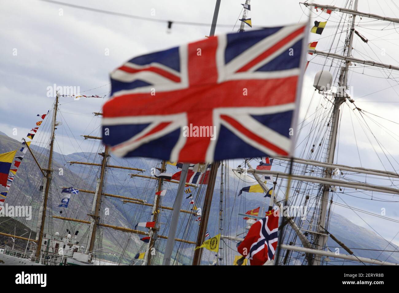A Union Jack flag amongst tall ships masts and rigging Stock Photo - Alamy