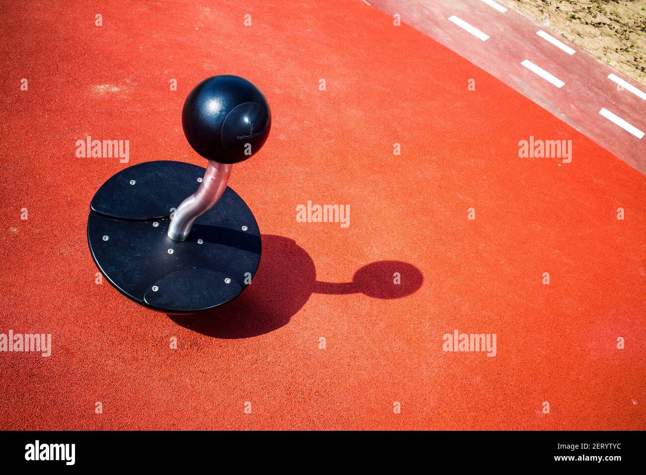 Kids playground with a red ground Stock Photo - Alamy