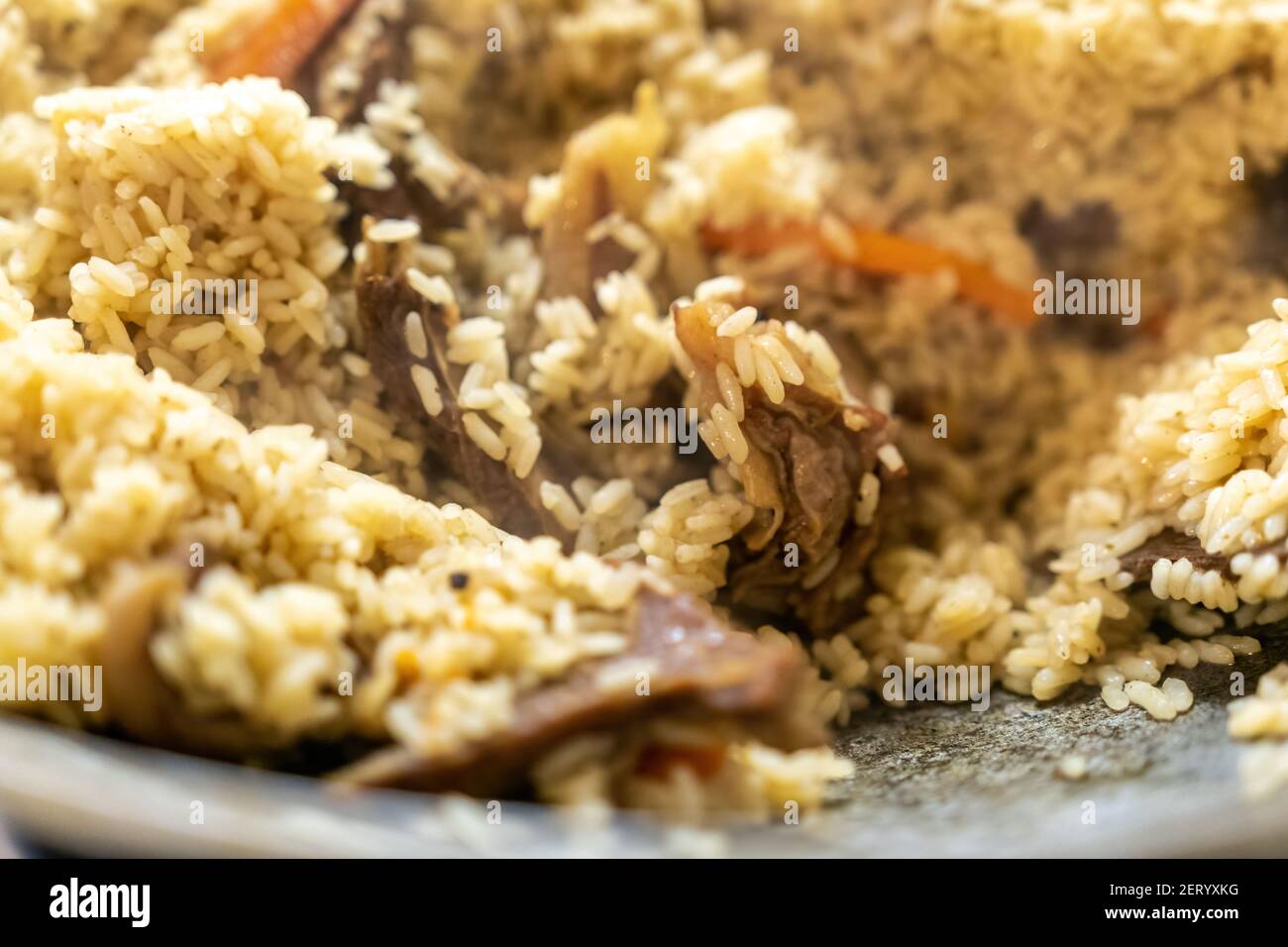 Selective focus. Large cauldron with freshly cooked rice. A series of ...