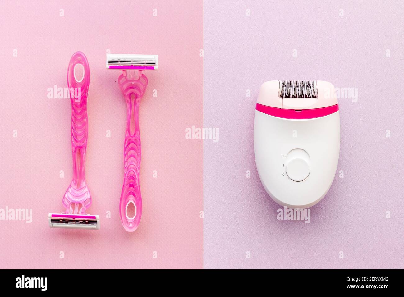Set of epilation means - epilator with razor. Top view Stock Photo - Alamy