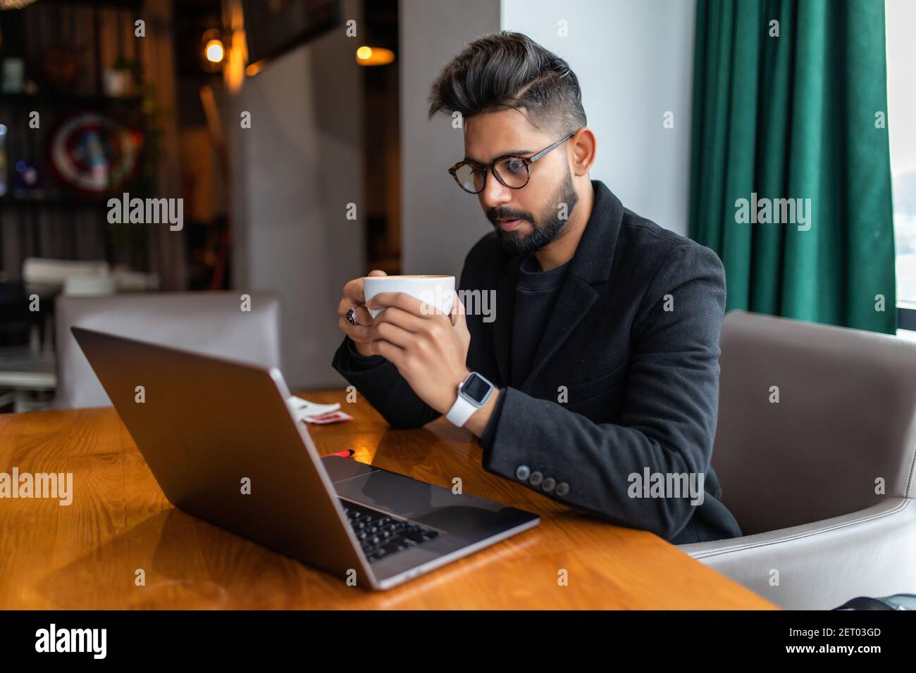 Pakistani man working office hi-res stock photography and images - Alamy