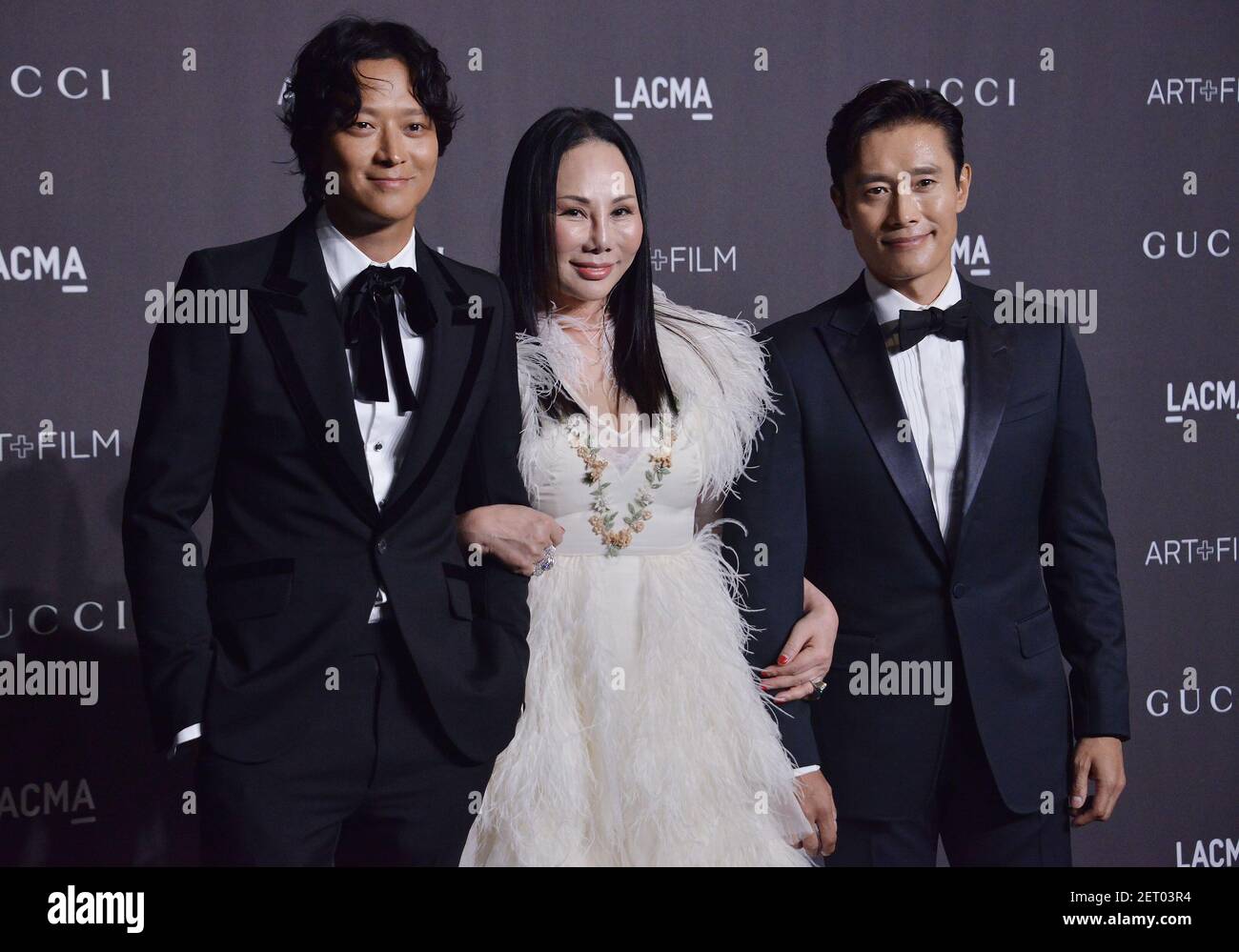 (L-R) Gang Dong-Won, Eva Chow and Lee Byung-hun at the 2018 LACMA Art ...