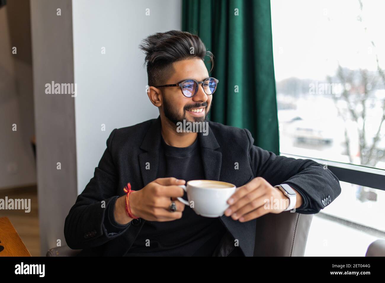 Indian business people drinking tea hi-res stock photography and images ...