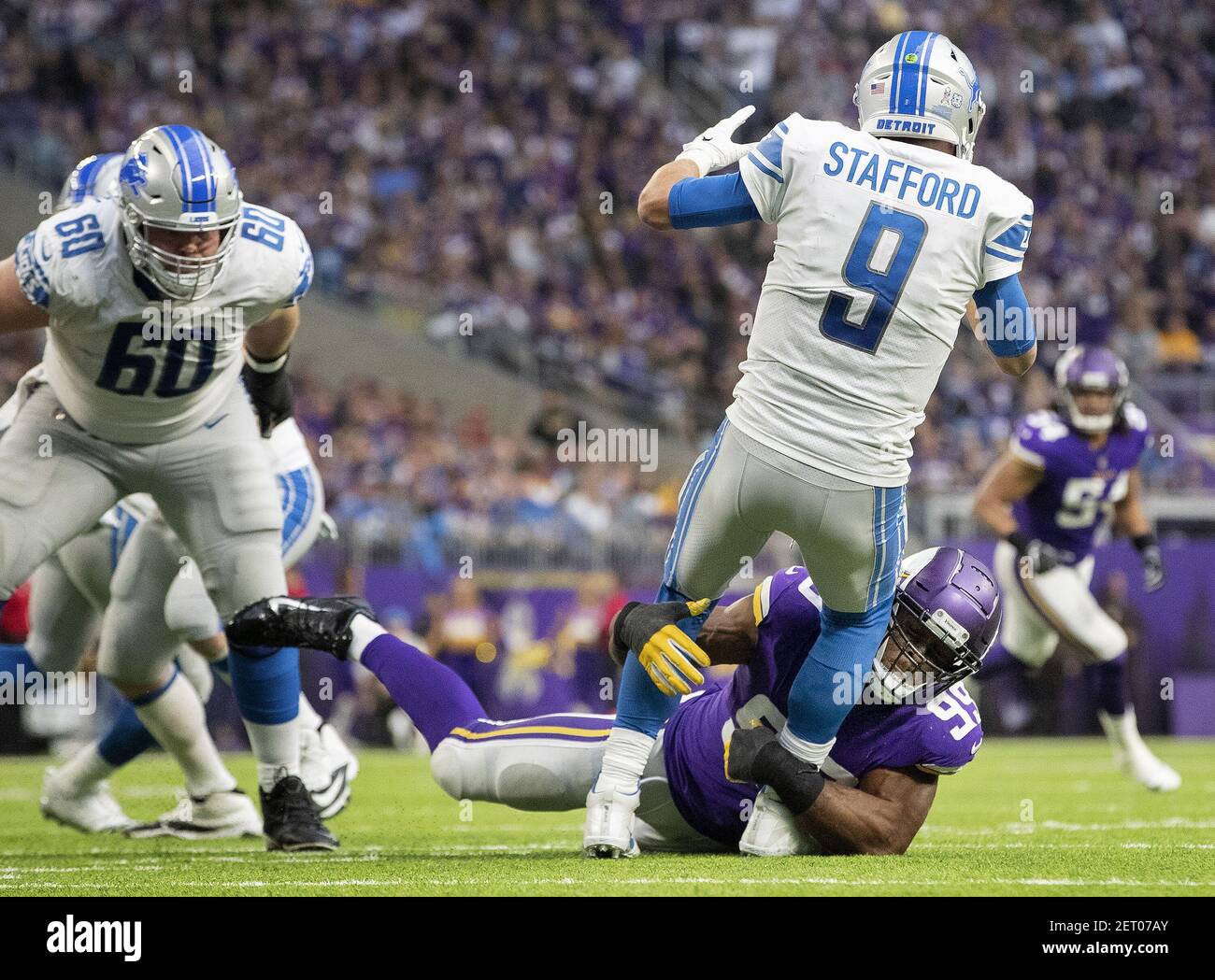 Minnesota Vikings' Danielle Hunter sacks Detroit Lions quarterback Matthew Stafford in the third ...