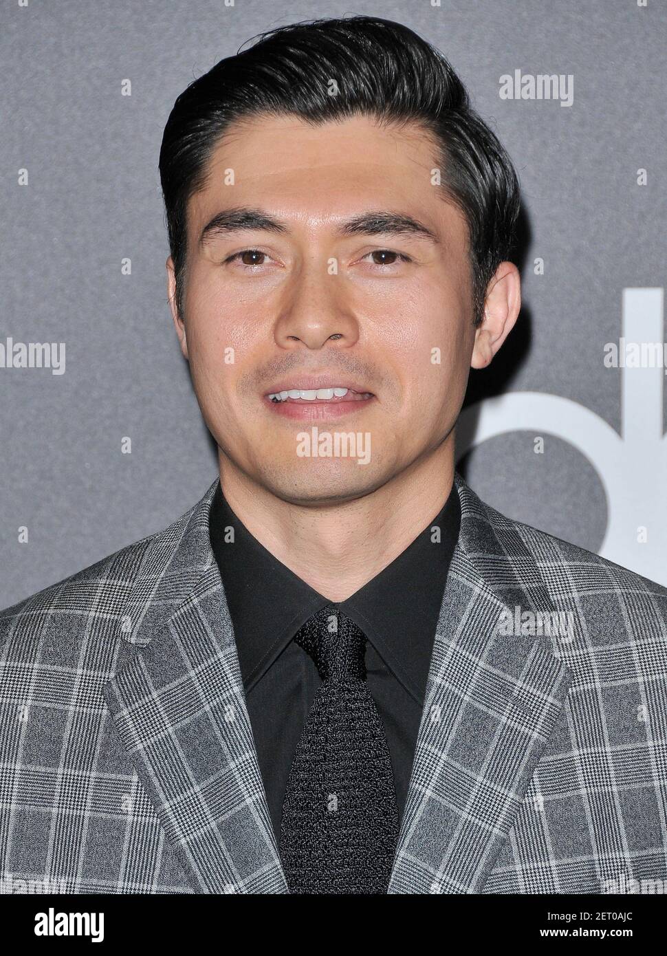 Henry Golding arrives at the 22nd Annual Hollywood Film Awards held at ...