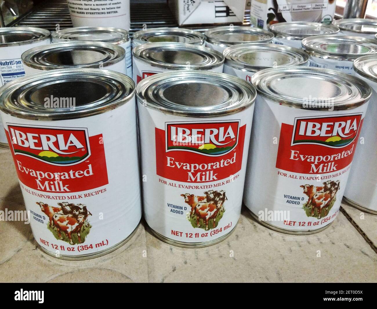 Cans of Iberia brand evaporated milk in a supermarket in New York on ...