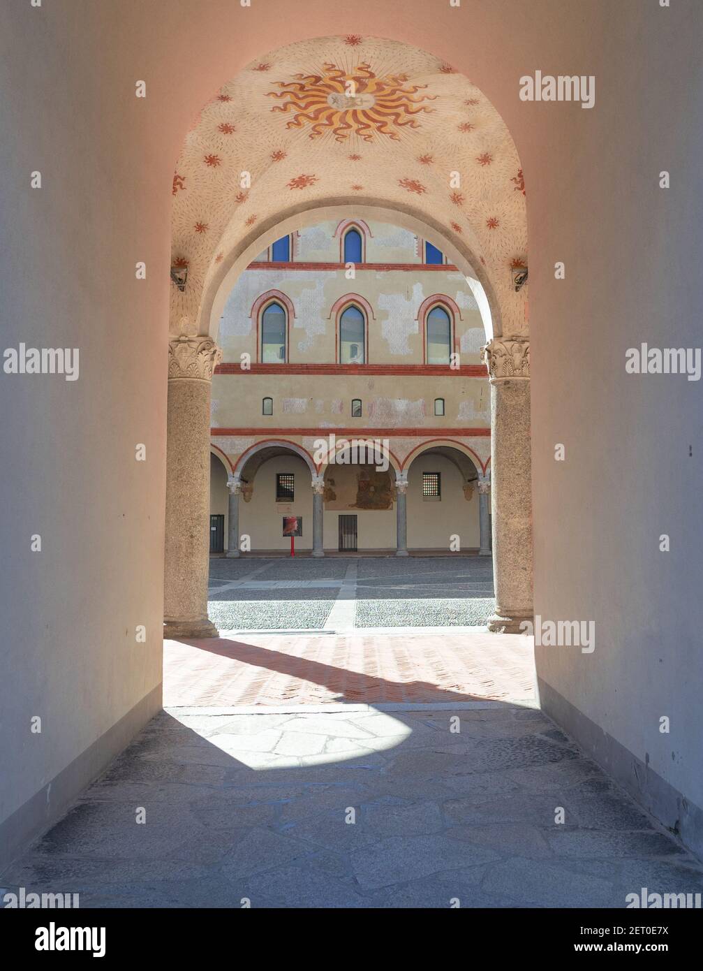 courtyard inside the medieval castle with columns, arched vaults ...