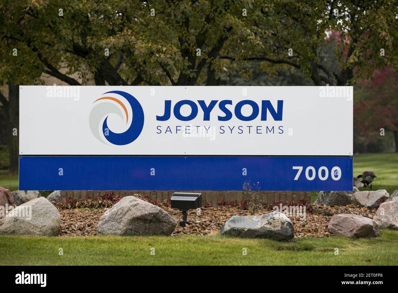 A logo sign outside of a facility occupied by Joyson Safety Systems in ...
