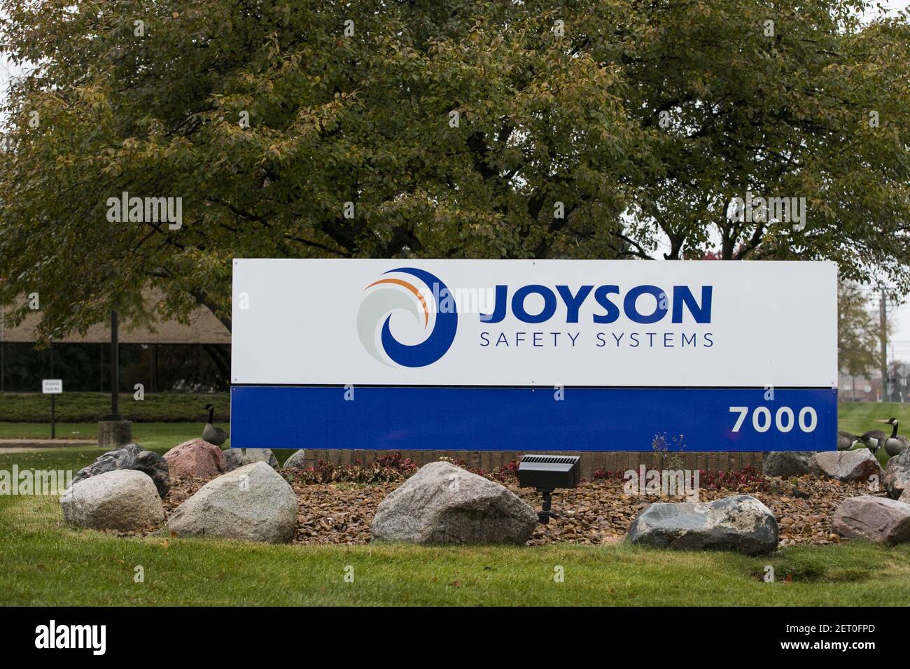 A logo sign outside of a facility occupied by Joyson Safety Systems in ...