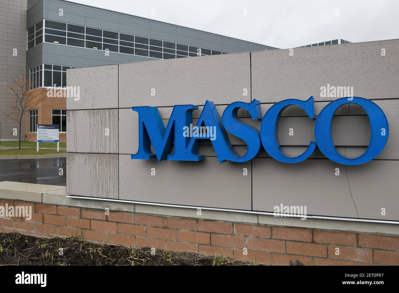 A logo sign outside of the headquarters of the Masco Corporation in ...