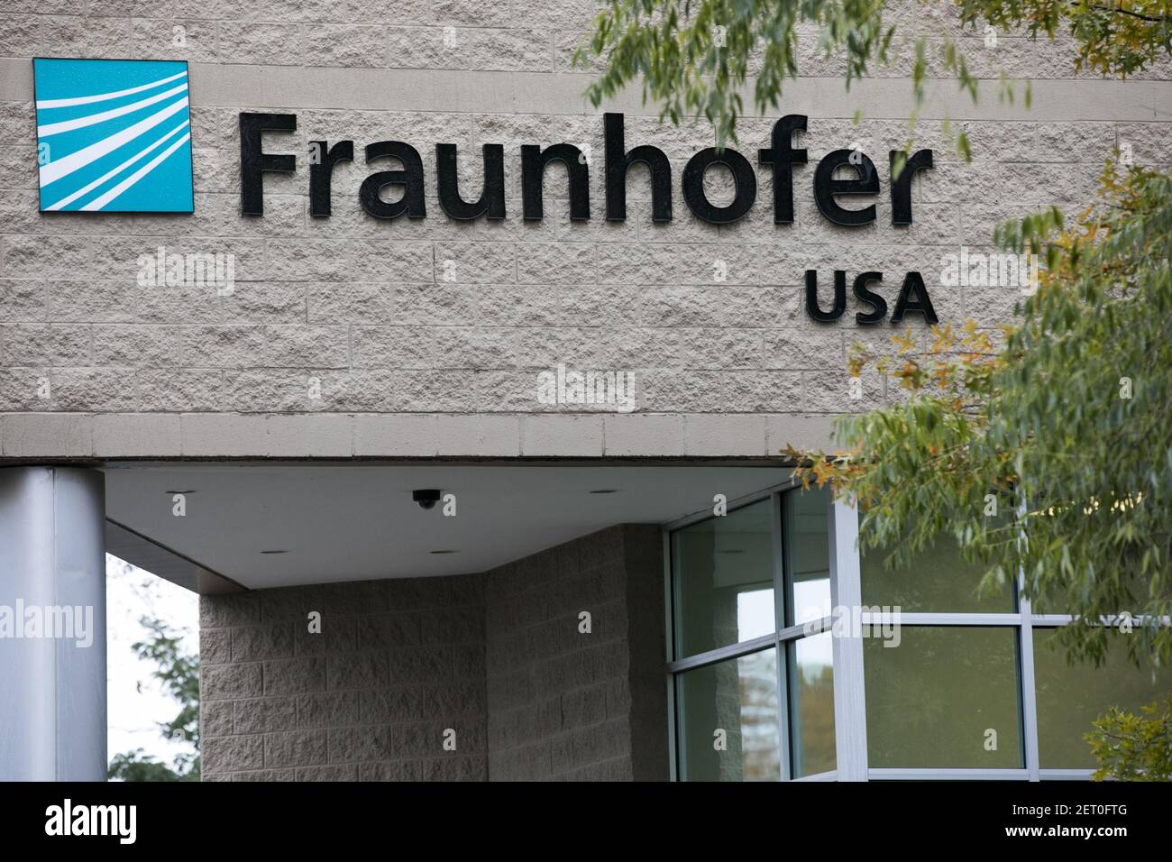 A logo sign outside of a facility occupied by The Fraunhofer Society in ...