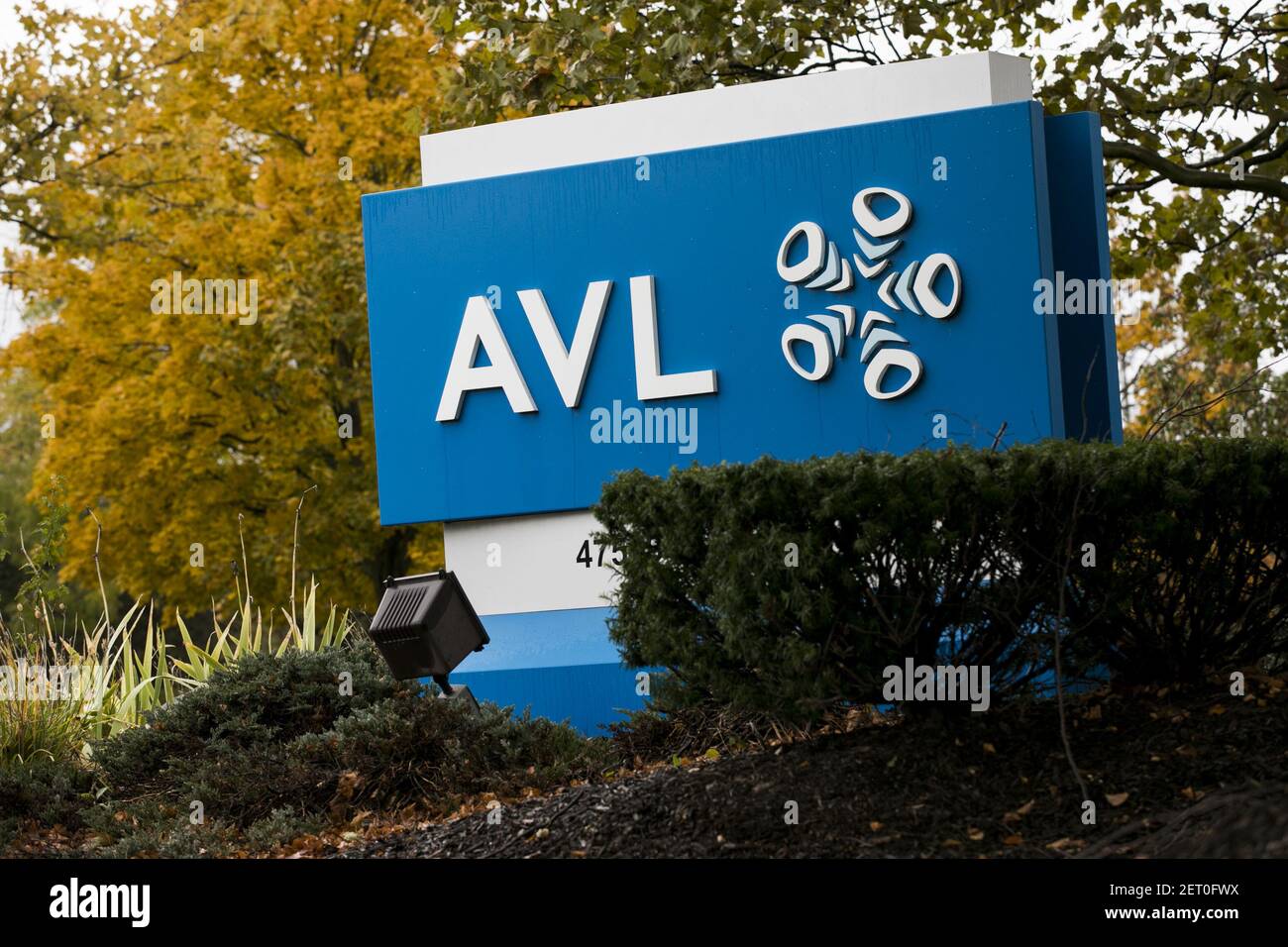 A logo sign outside of a facility occupied by AVL (Anstalt für ...