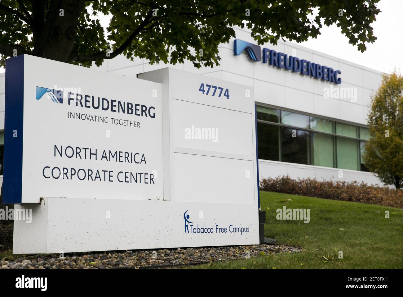 A logo sign outside of a facility occupied by The Freudenberg Group in ...