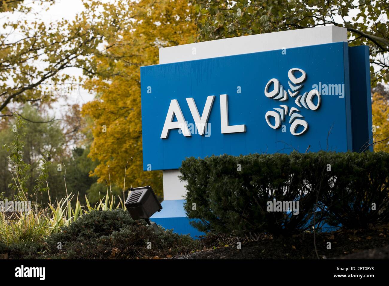 A logo sign outside of a facility occupied by AVL (Anstalt für ...