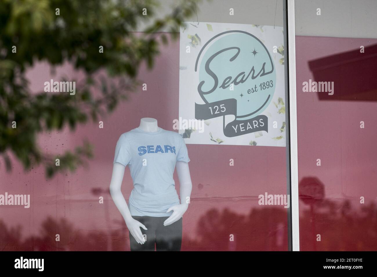 A logo sign outside of Sears retail store in Livonia, Michigan on ...