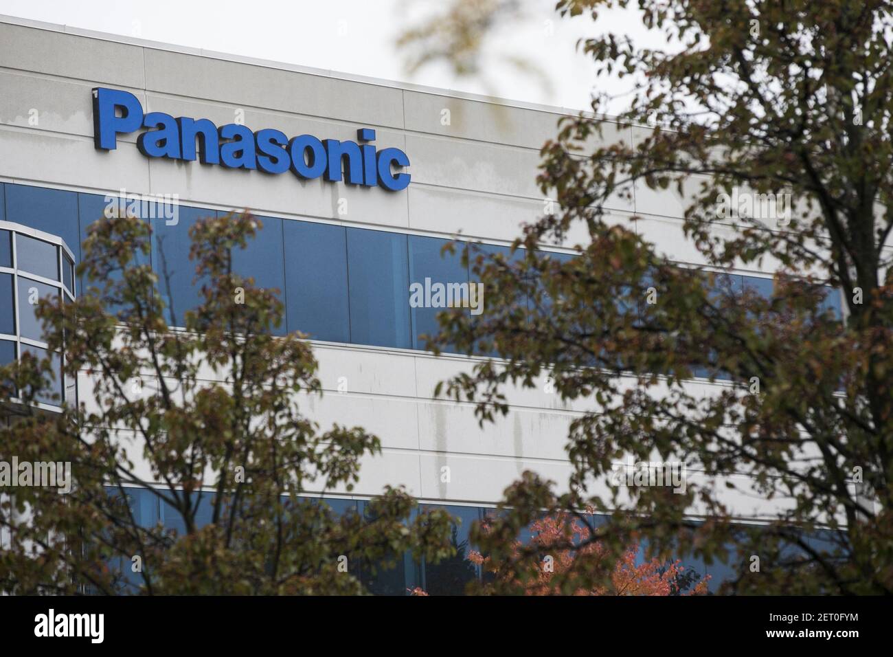A logo sign outside of a facility occupied by Panasonic Automotive ...