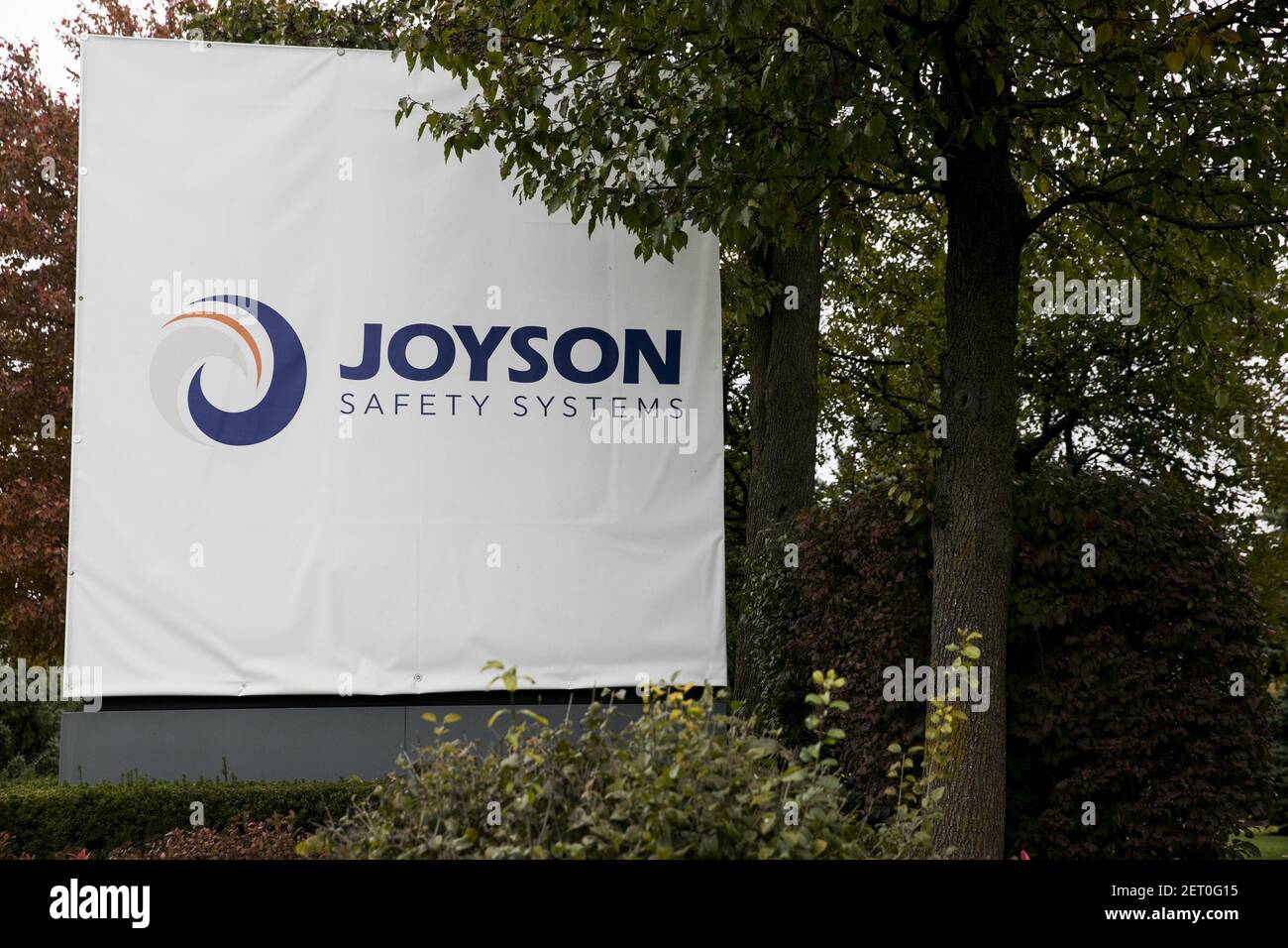 A logo sign outside of a facility occupied by Joyson Safety Systems in ...
