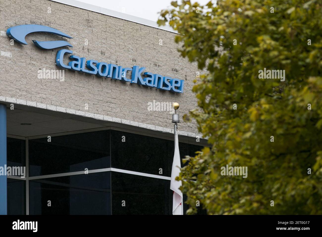 A logo sign outside of a facility occupied by Calsonic Kansei in ...