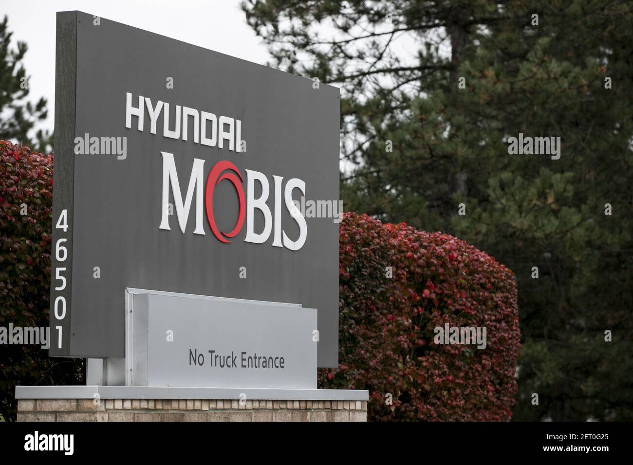 A logo sign outside of a facility occupied by Hyundai Mobis in Plymouth ...