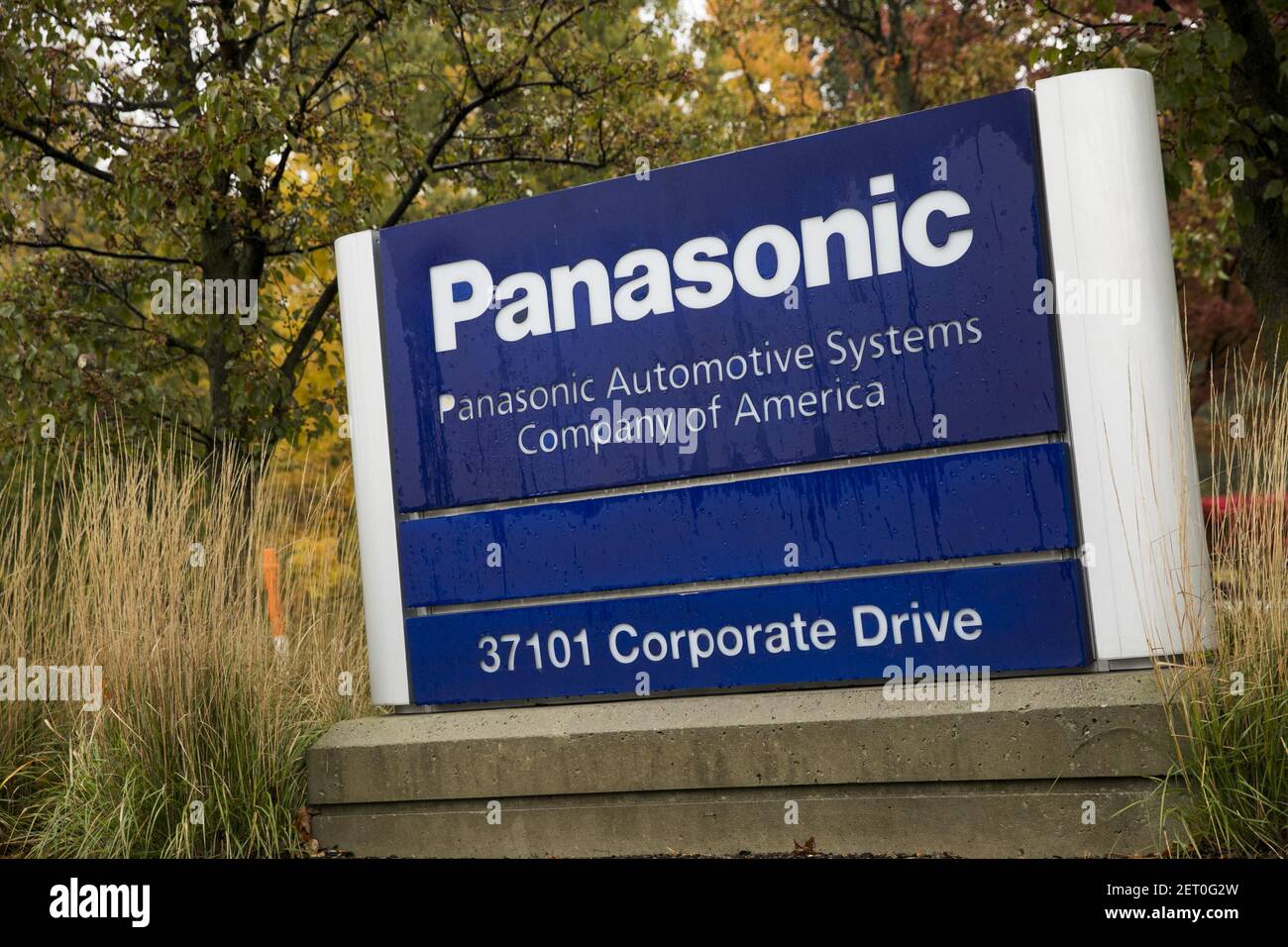A logo sign outside of a facility occupied by Panasonic Automotive ...
