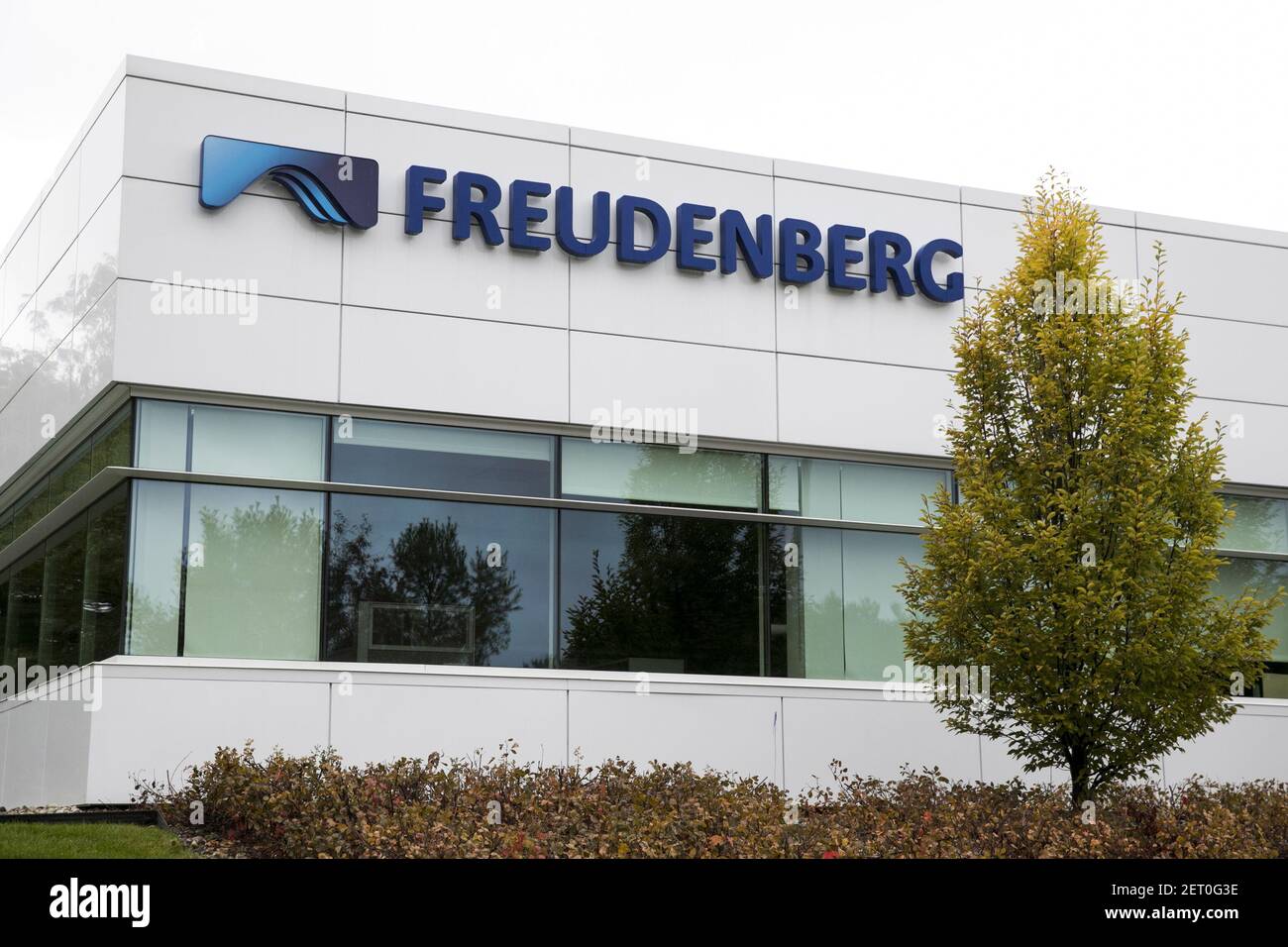 A logo sign outside of a facility occupied by The Freudenberg Group in ...