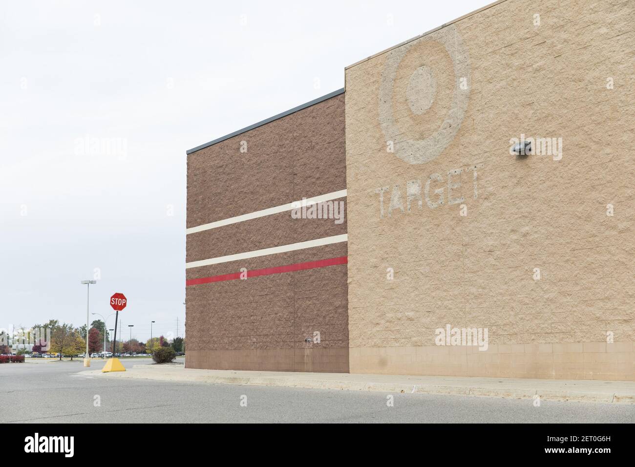 The faded outline of a logo sign outside of a closed Target Corporation ...
