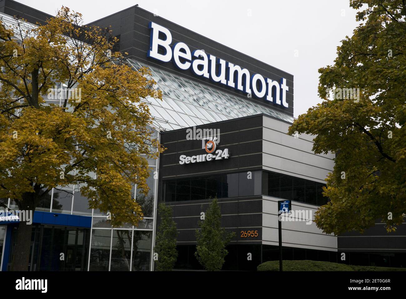 A logo sign outside of a facility occupied by Beaumont Health in ...
