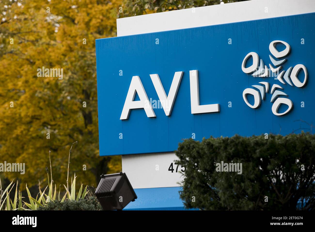 A logo sign outside of a facility occupied by AVL (Anstalt für ...