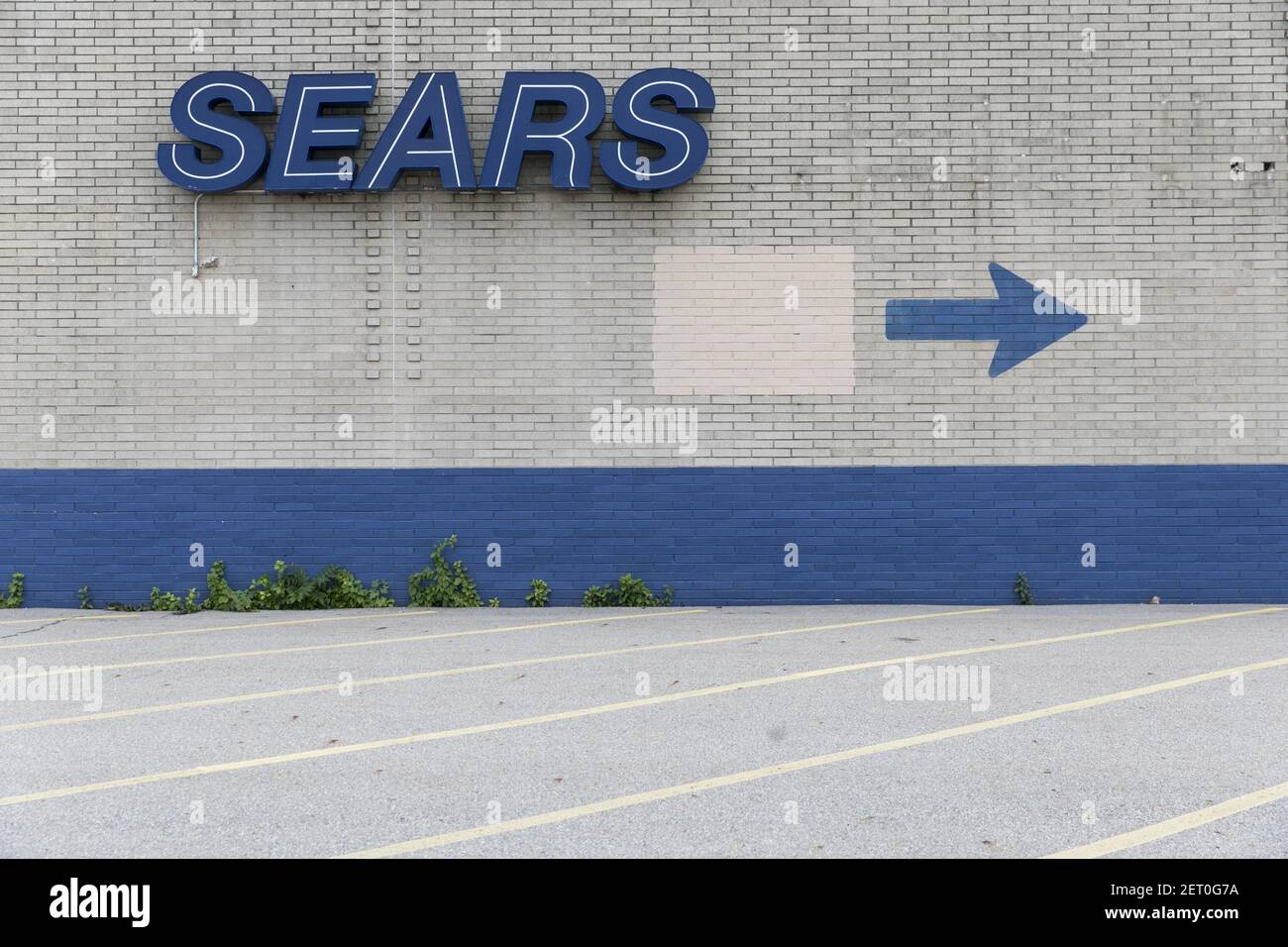 A logo sign outside of Sears retail store in Livonia, Michigan on ...