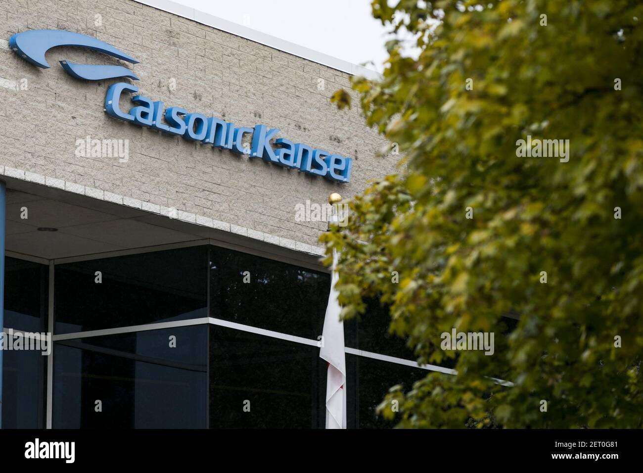 A logo sign outside of a facility occupied by Calsonic Kansei in ...
