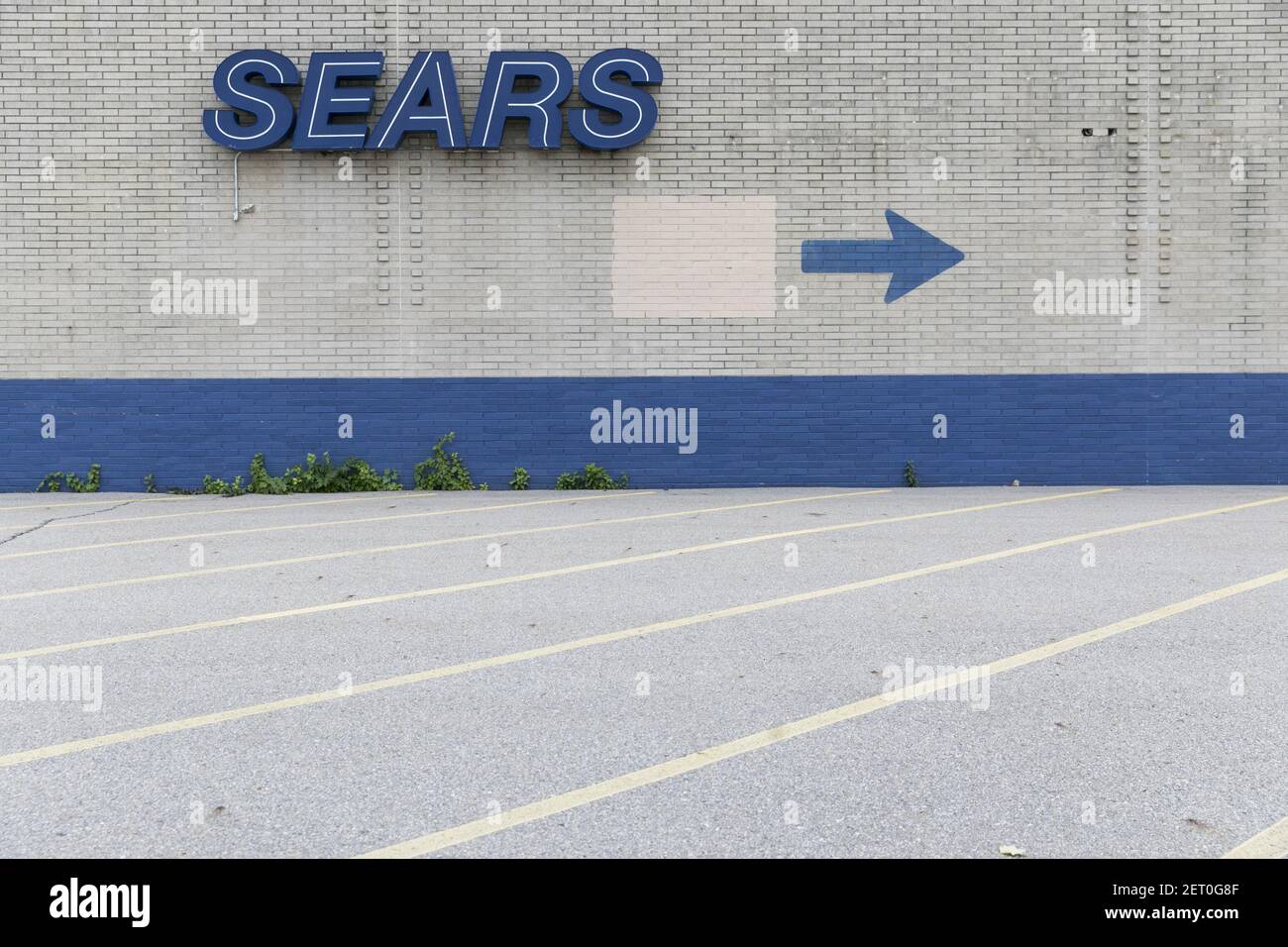 A logo sign outside of Sears retail store in Livonia, Michigan on ...