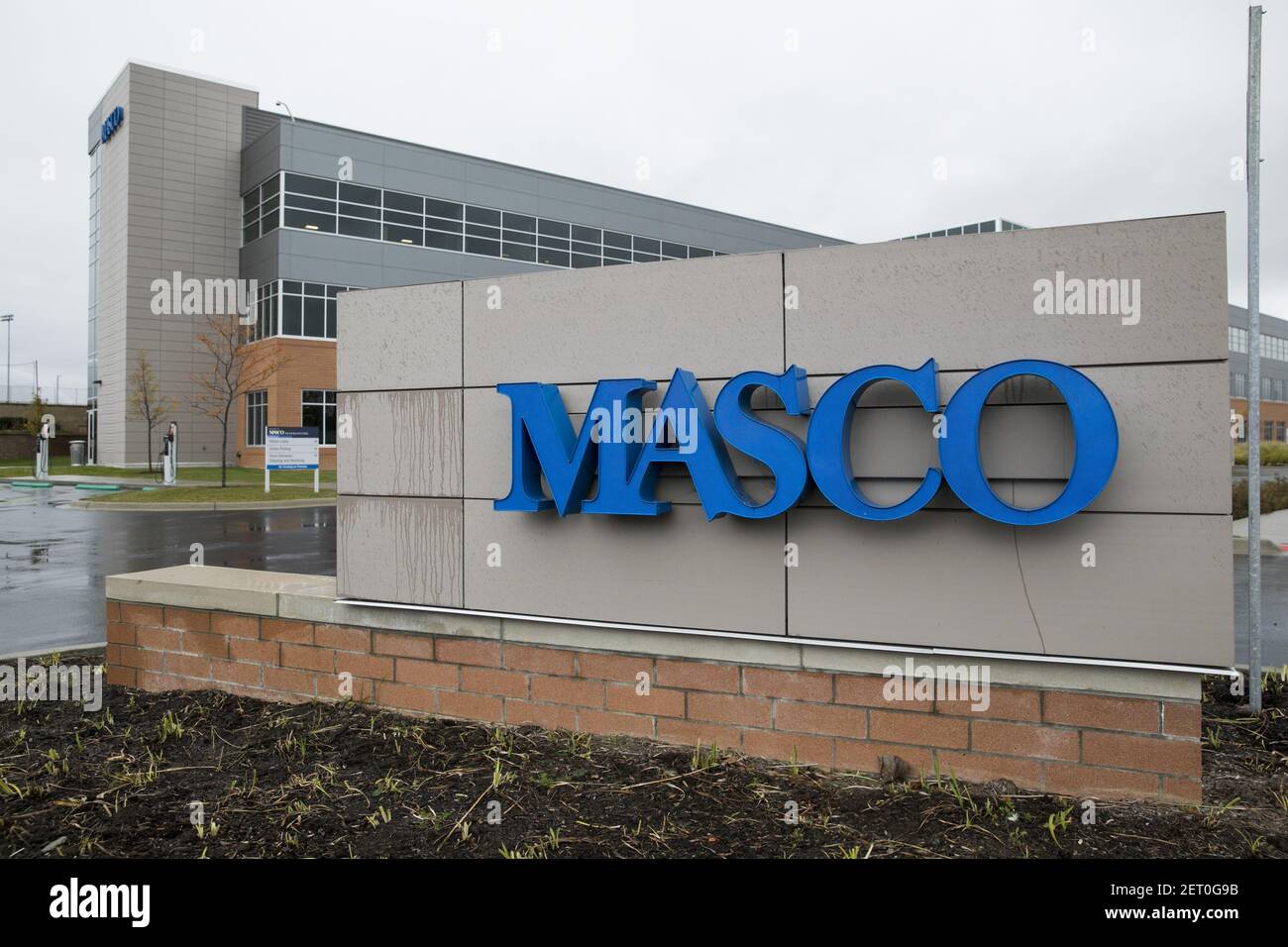 A logo sign outside of the headquarters of the Masco Corporation in ...