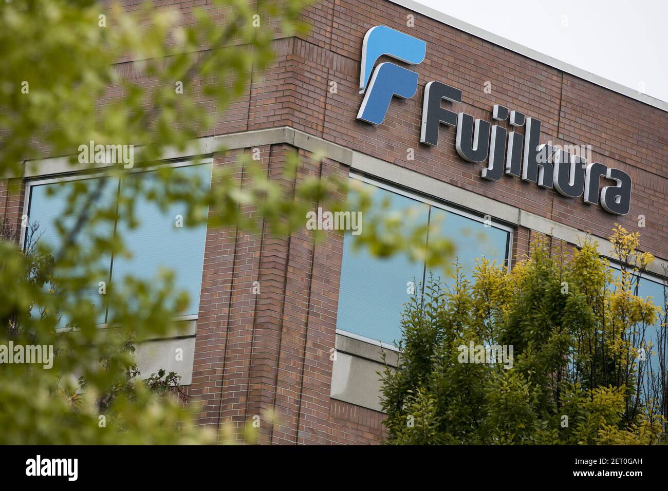A logo sign outside of a facility occupied by Fujikura Ltd., in ...